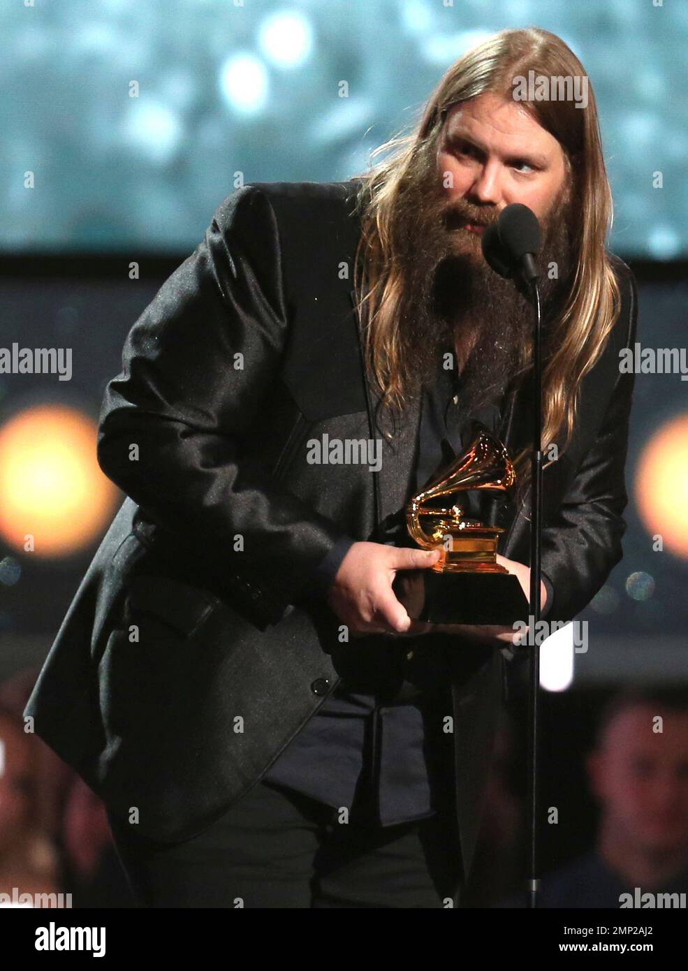 Chris Stapleton accepts the award for best country album for "From A ...