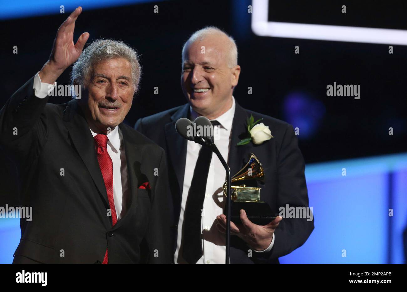 Tony Bennett, left, and Dae Bennett accept the best traditional pop ...