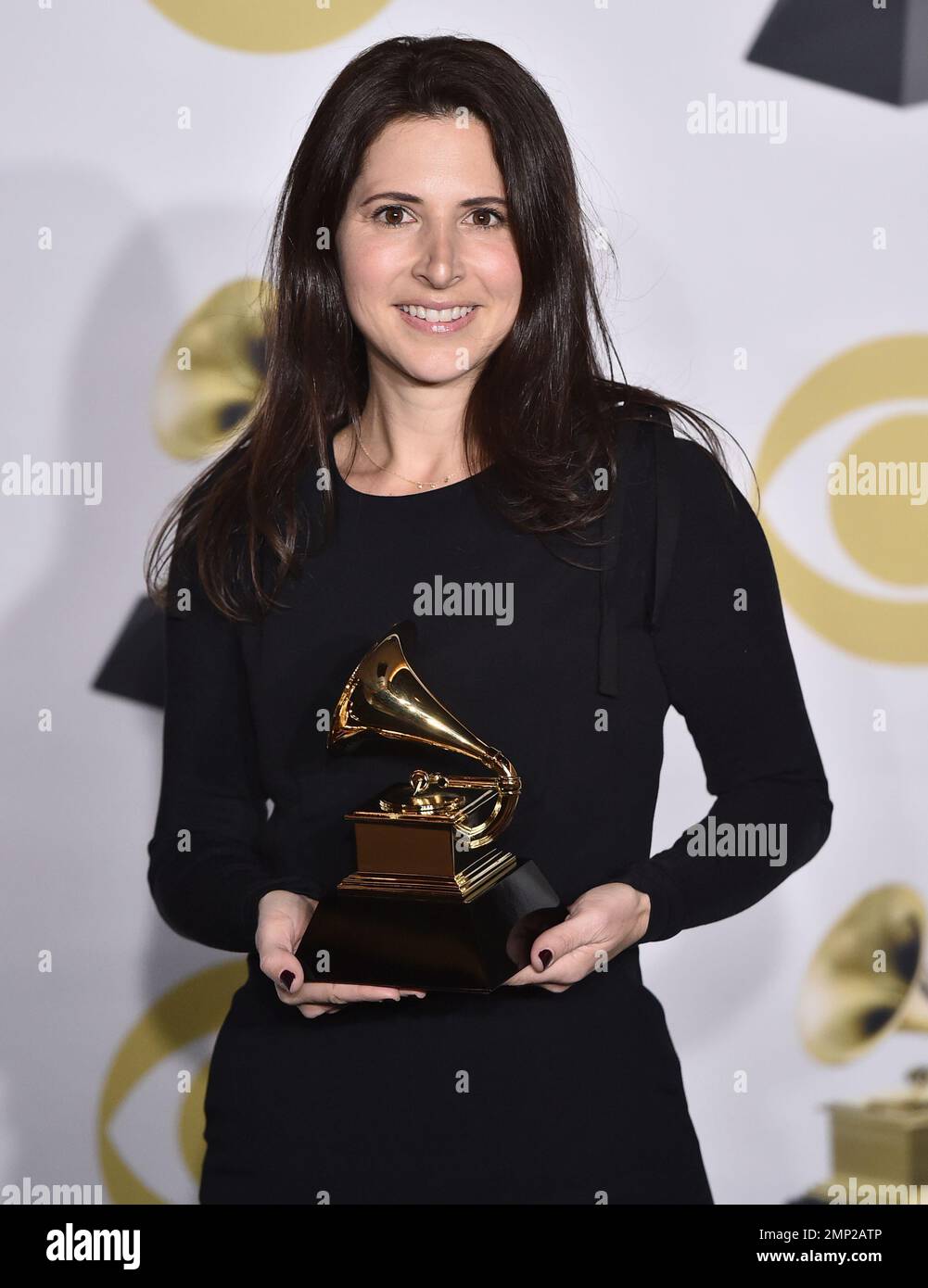 Jamie Rabineau poses in the press room with the best music video award ...