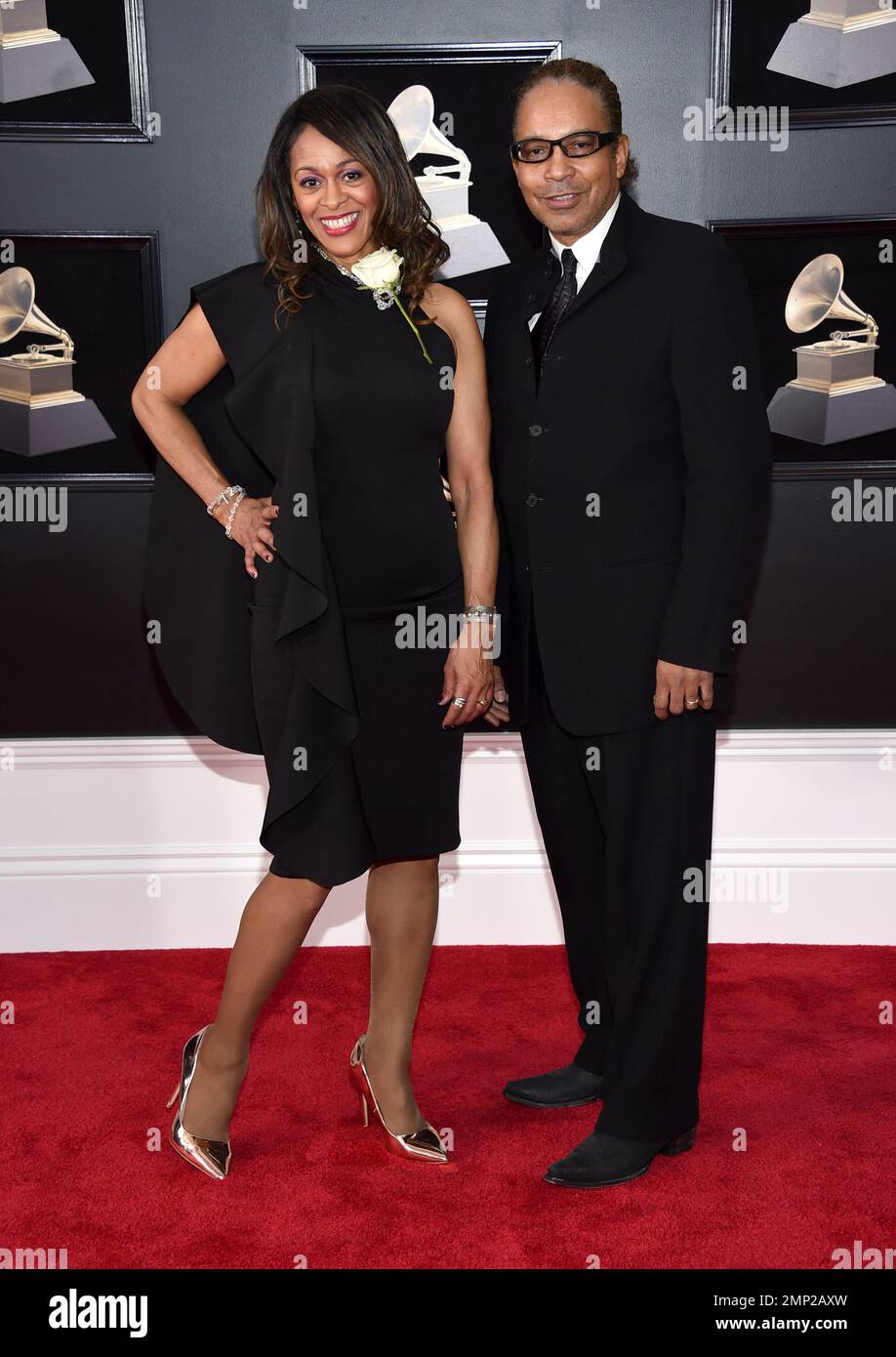 Sonya Hensley, left, and MC Sheriff arrive at the 60th annual Grammy ...
