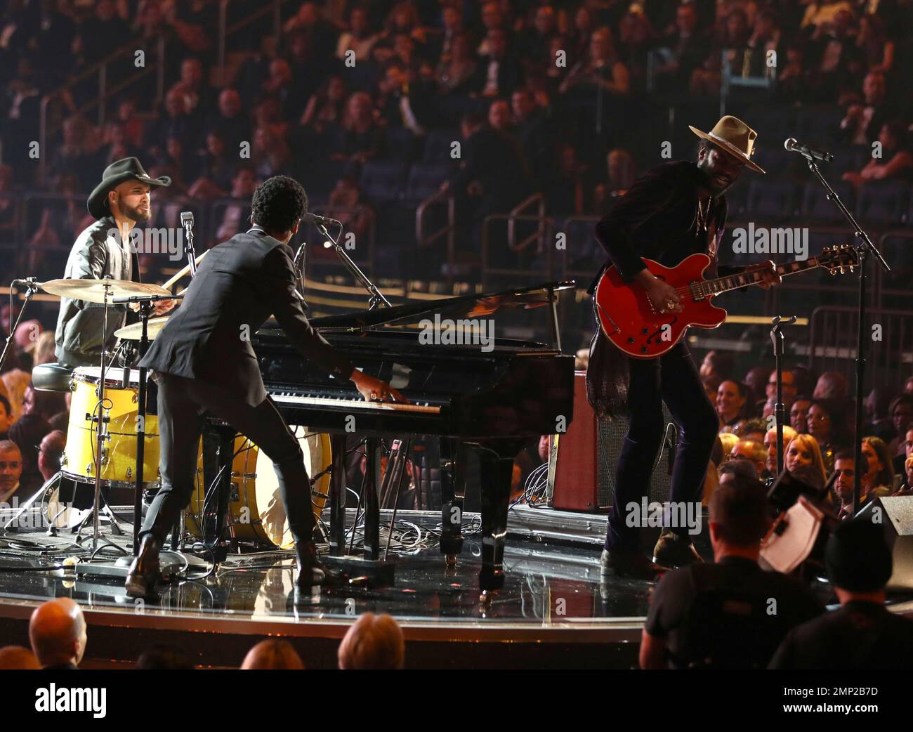 Joe Saylor,, from left, Jon Batiste and Gary Clark Jr. perform a ...