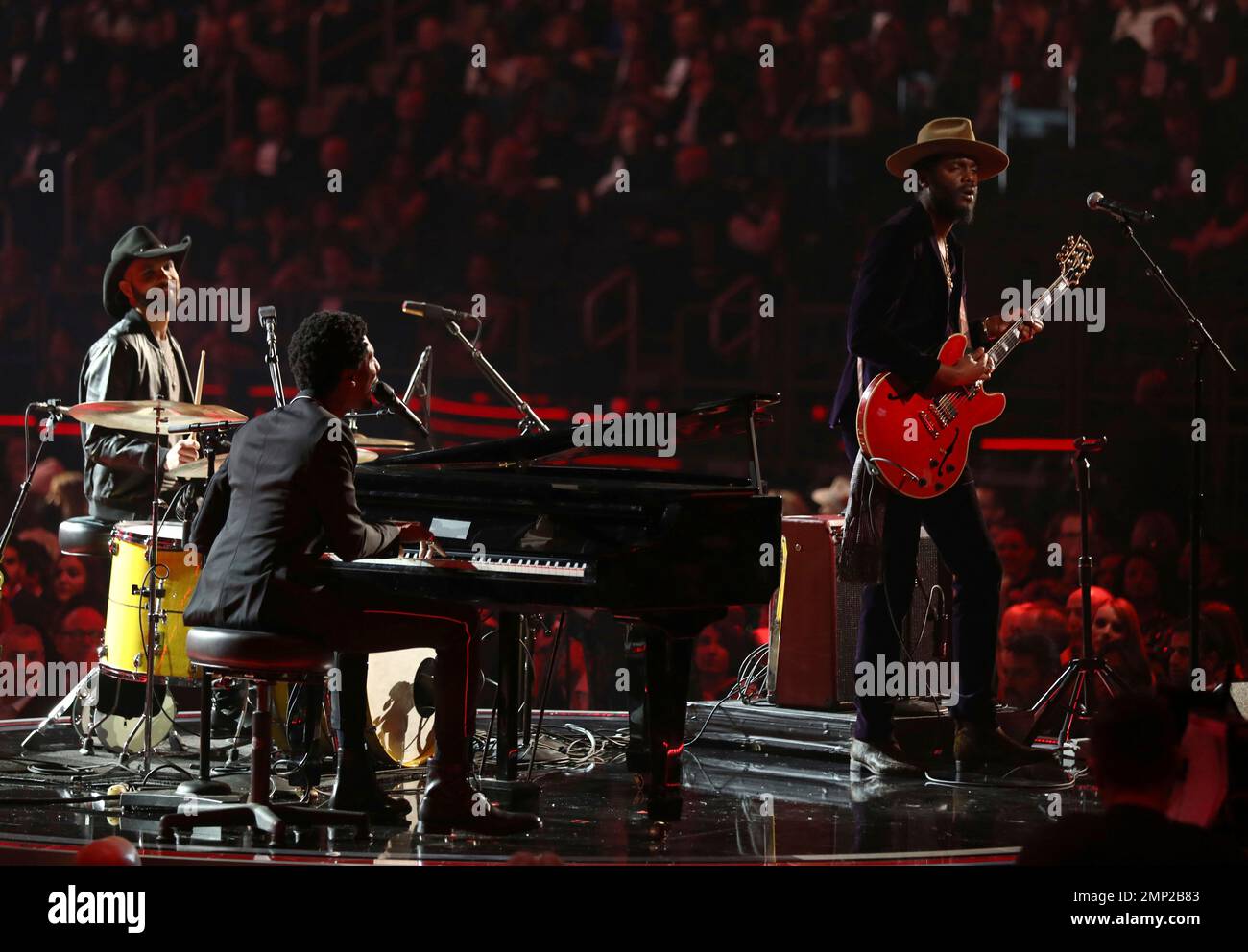 Joe Saylor, from left, Jon Batiste and Gary Clark Jr. perform a tribute ...