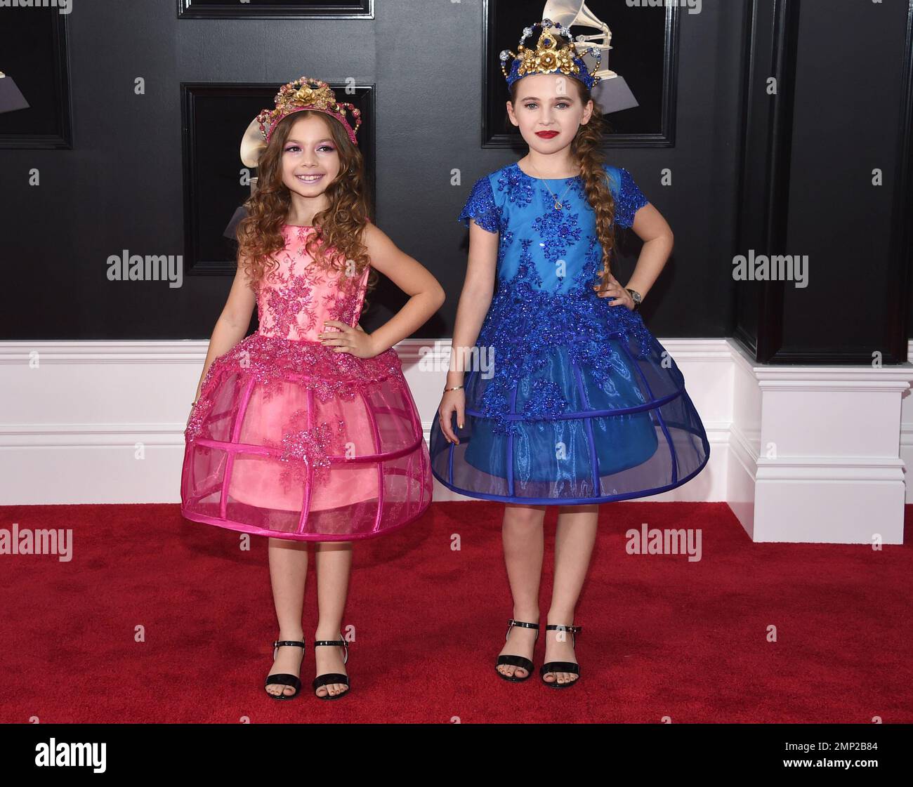 Olivia Jellen, left, and Sofia Jellen arrive at the 60th annual Grammy ...