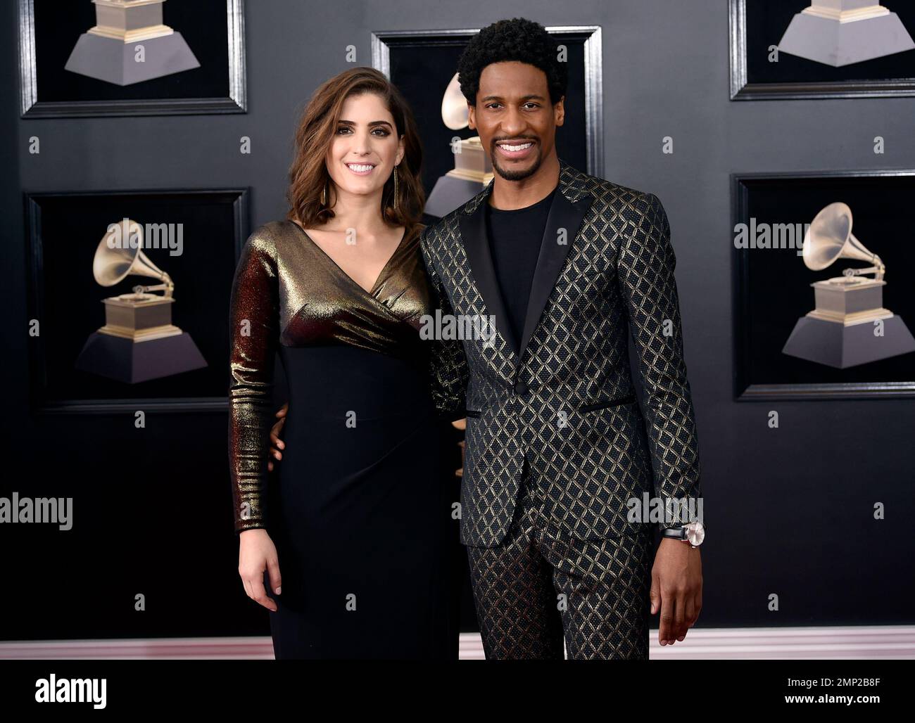 Suleika Jaouad, left, and Jon Batiste arrive at the 60th annual Grammy ...