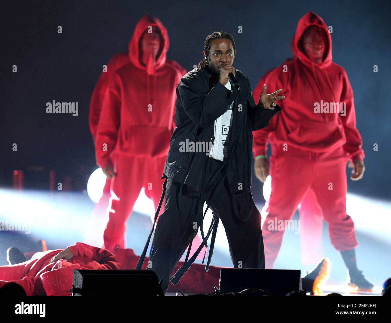 Kendrick Lamar, center, performs at the 60th annual Grammy Awards at ...