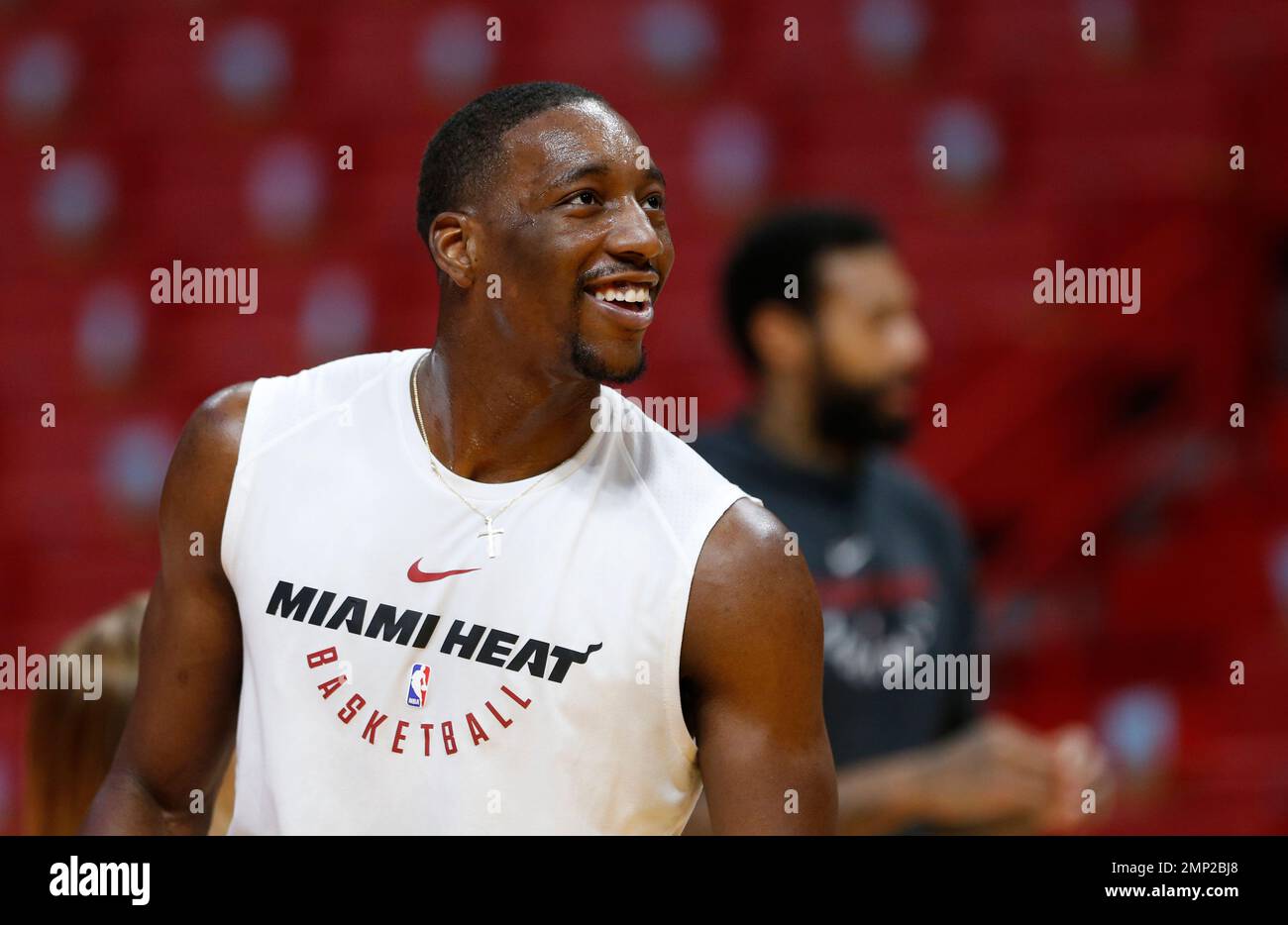 Miami Heat center Bam Adebayo smiles as he warms up before the start of ...