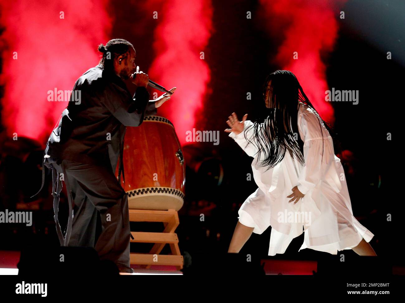 Kendrick Lamar , left, performs onstage at the 60th annual Grammy ...