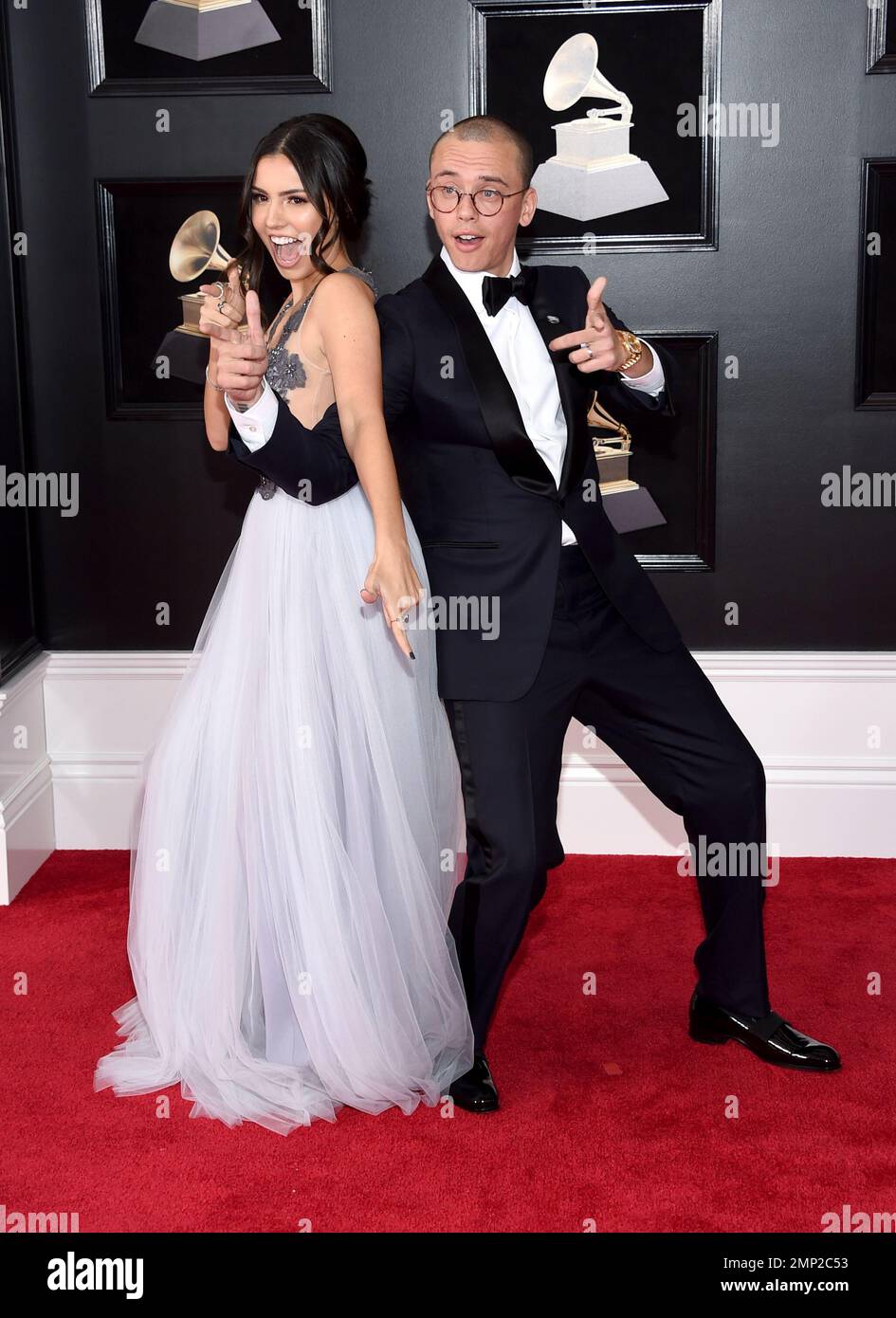 Jessica Andrea, left, and Logic arrive at the 60th annual Grammy Awards ...