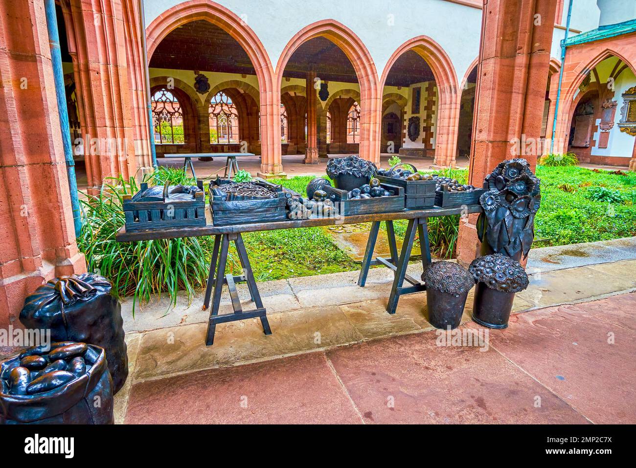 The bronze sculpture of vegetables and fruits in small cloister of ...