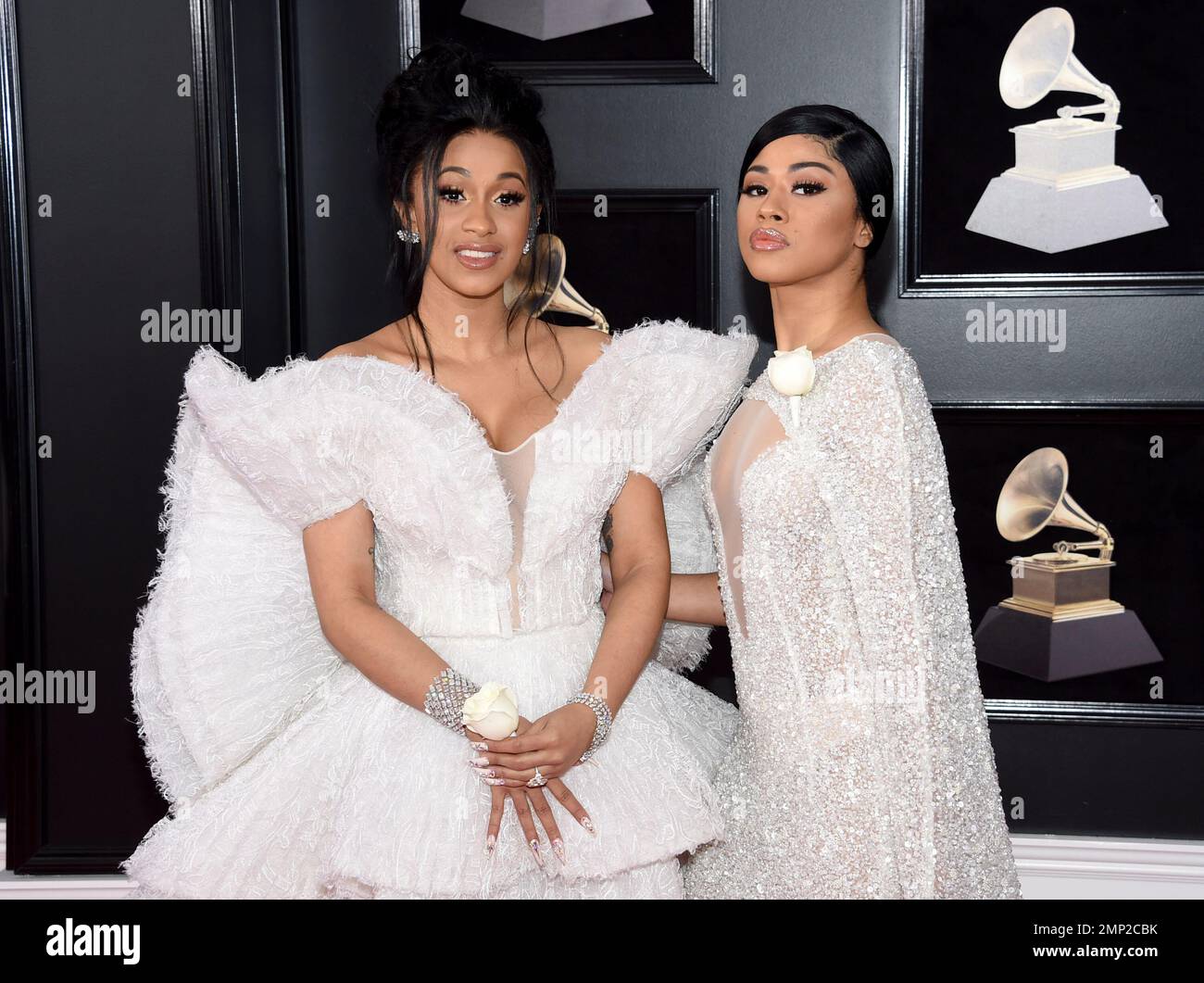 Cardi B, left, and Hennessy Carolina arrive at the 60th annual Grammy ...