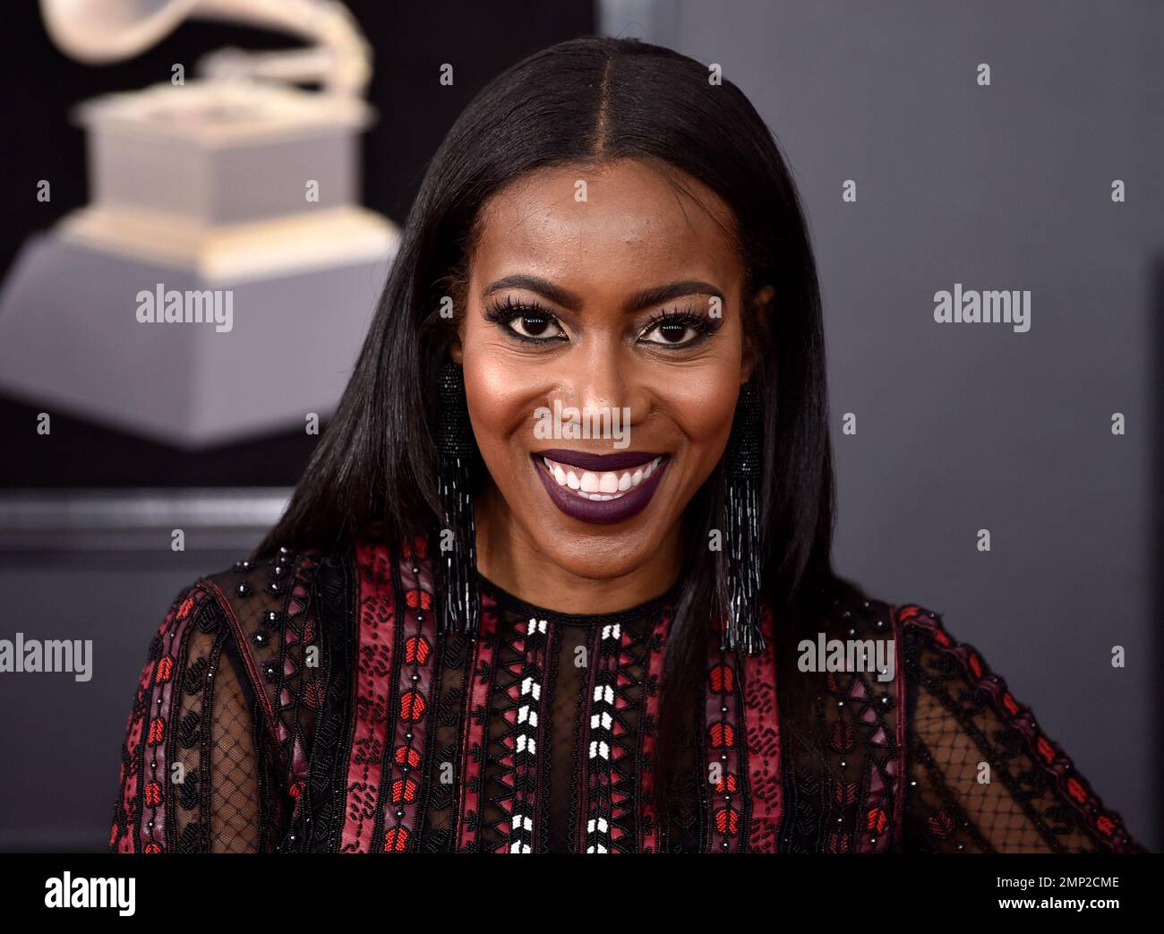 Tiffany Reid arrives at the 60th annual Grammy Awards at Madison Square ...