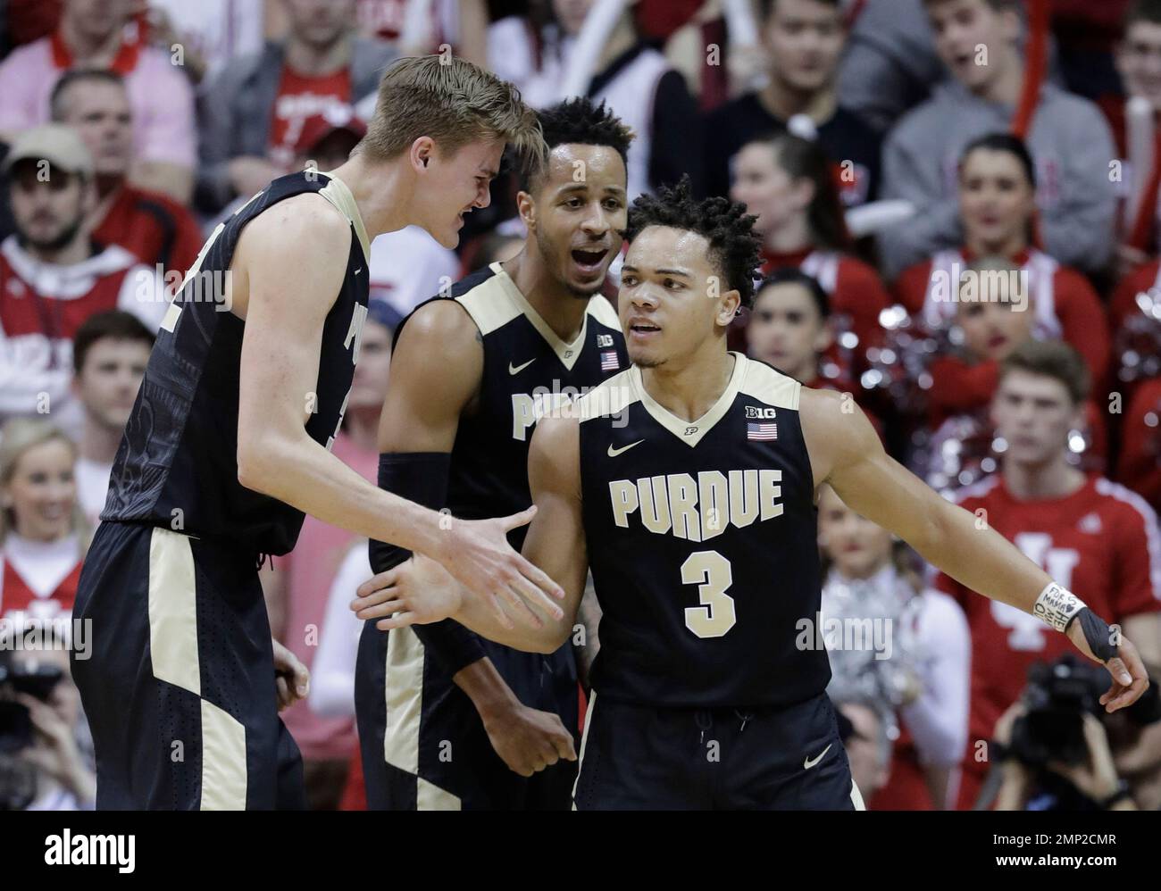 Purdue's Carsen Edwards (3) reacts with Matt Haarms, left, and Vincent ...