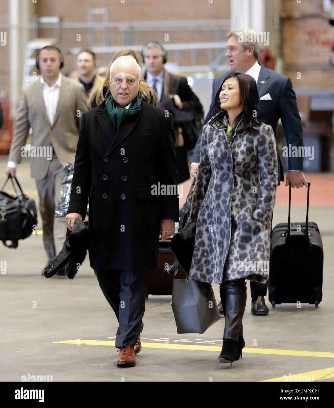 Philadelphia Eagles owner Jeffrey Lurie, left, and his wife, Tina Lai, right, arrive with the ...