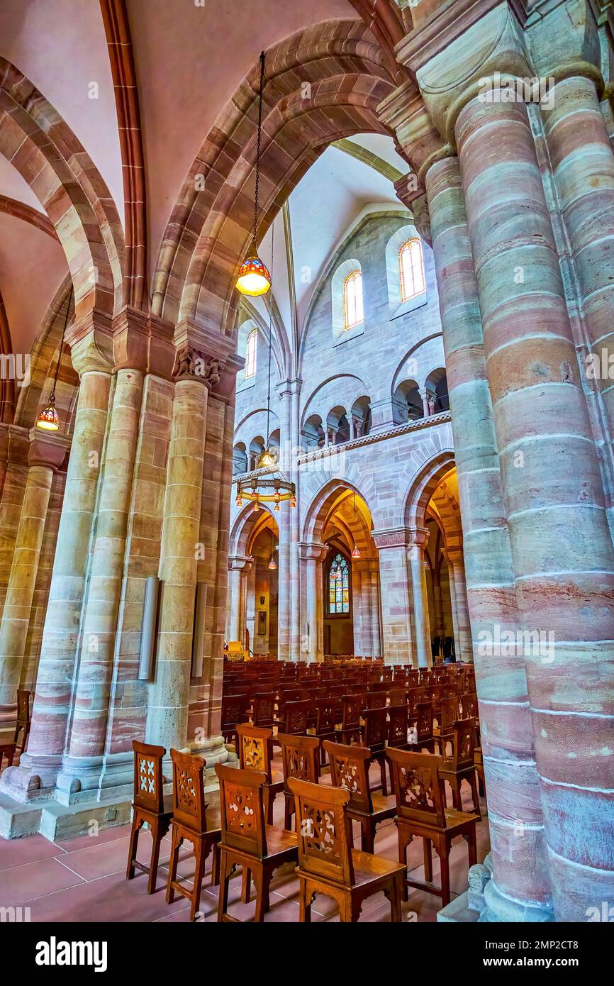 BASEL, SWITZERLAND - APRIL 1, 2022: The view through the arcade on the ...