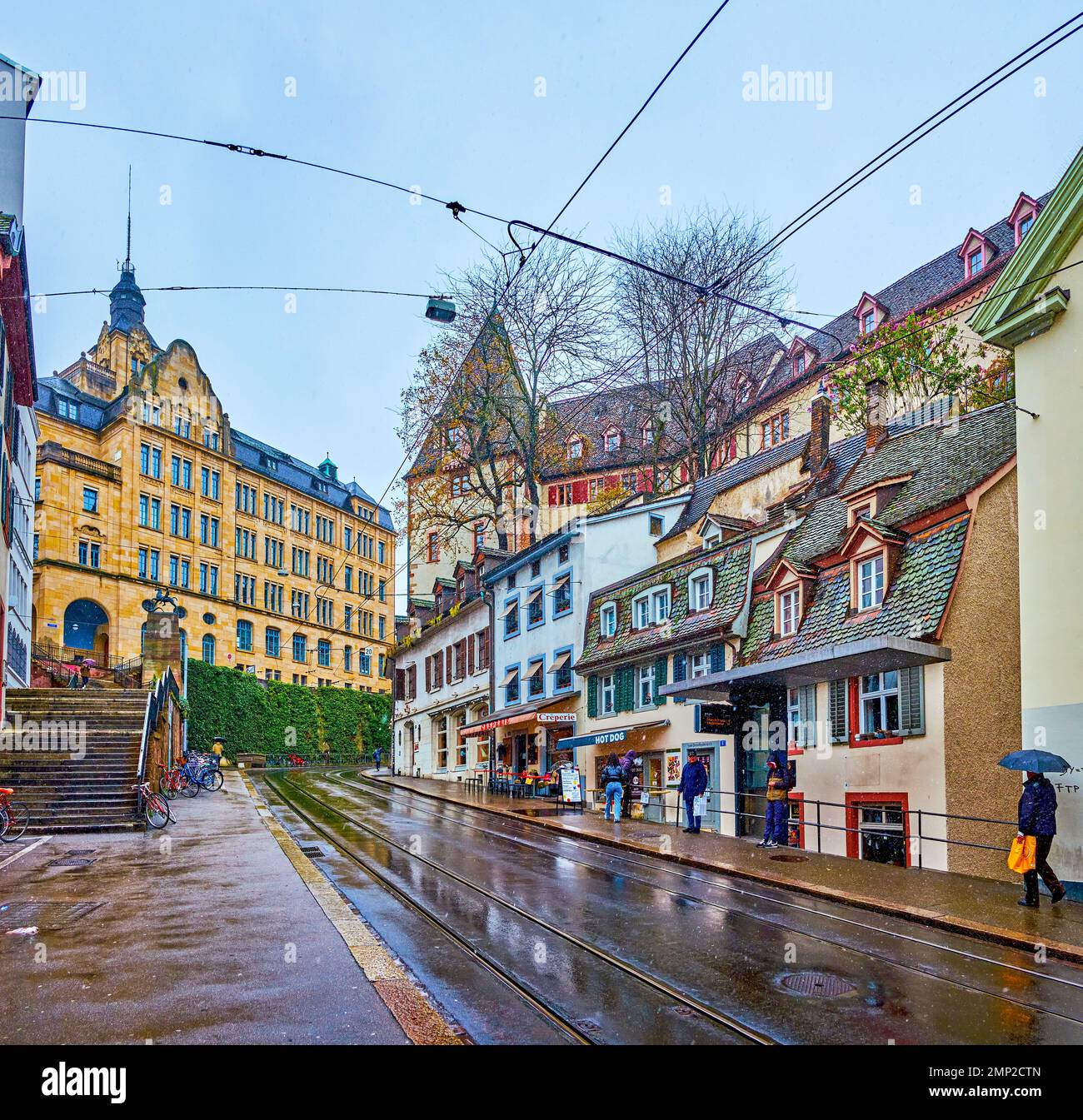 BASEL, SWITZERLAND - APRIL 1, 2022: Walk along Kohlenberg street in ...
