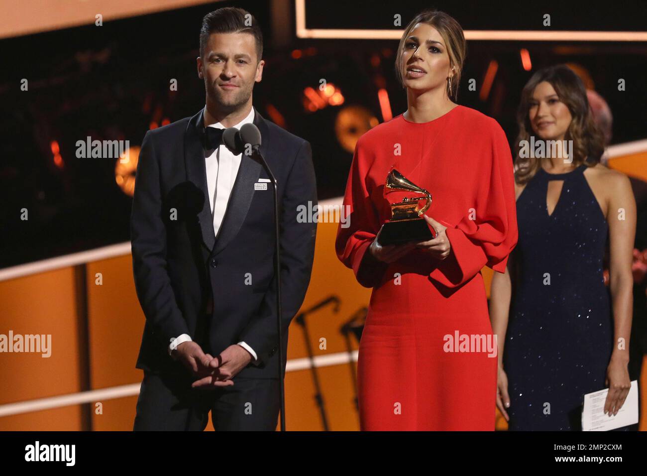 Ben Fielding, left, and Brooke Ligertwood, of Hillsong Worship, accept ...