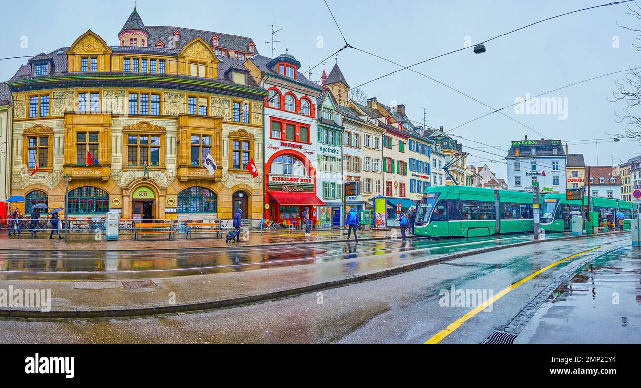 BASEL, SWITZERLAND - APRIL 1, 2022: The rainy weather on Barfusserplatz ...