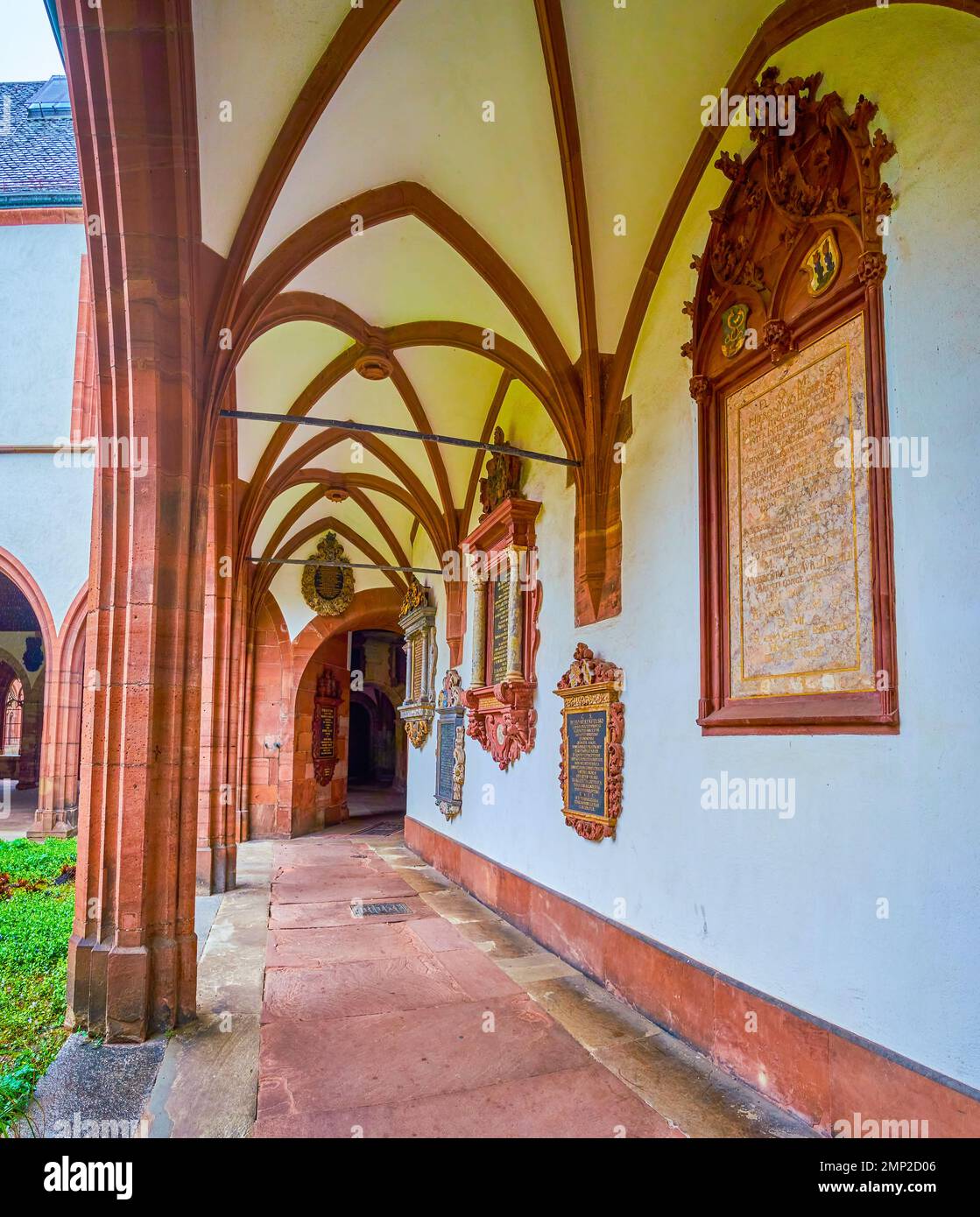 The covered corridor with historic stone plates, Small cloister of ...