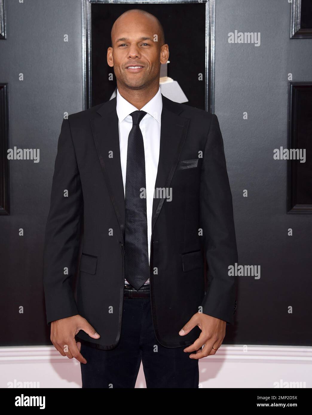 Shayne Ebudo arrives at the 60th annual Grammy Awards at Madison Square ...