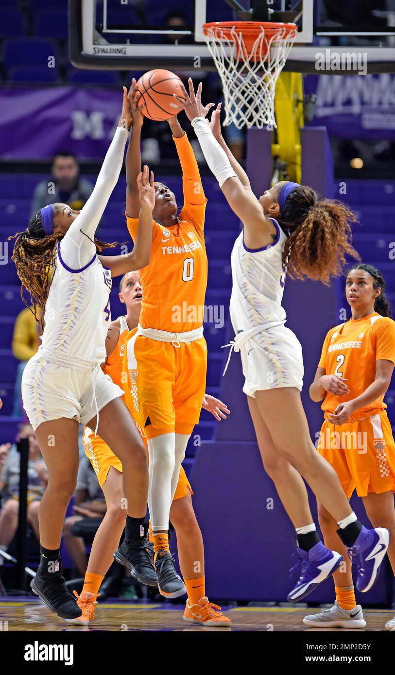 Tennessee guard Rennia Davis (0) battles for a rebound between LSU ...