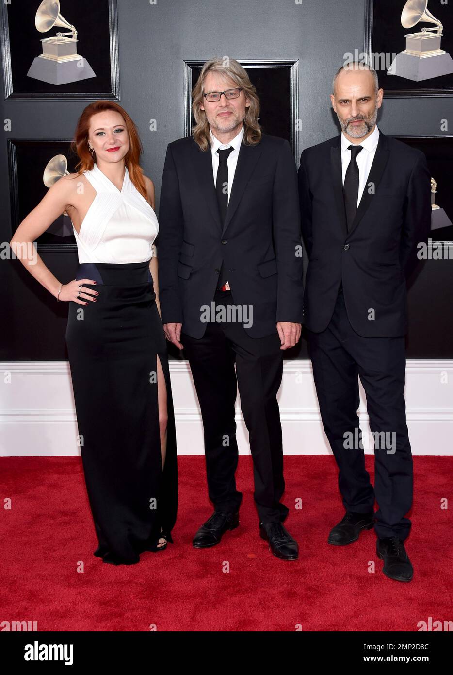 Dulcie Kellett, from left, Andrew Dominik and James Wilson arrive at ...