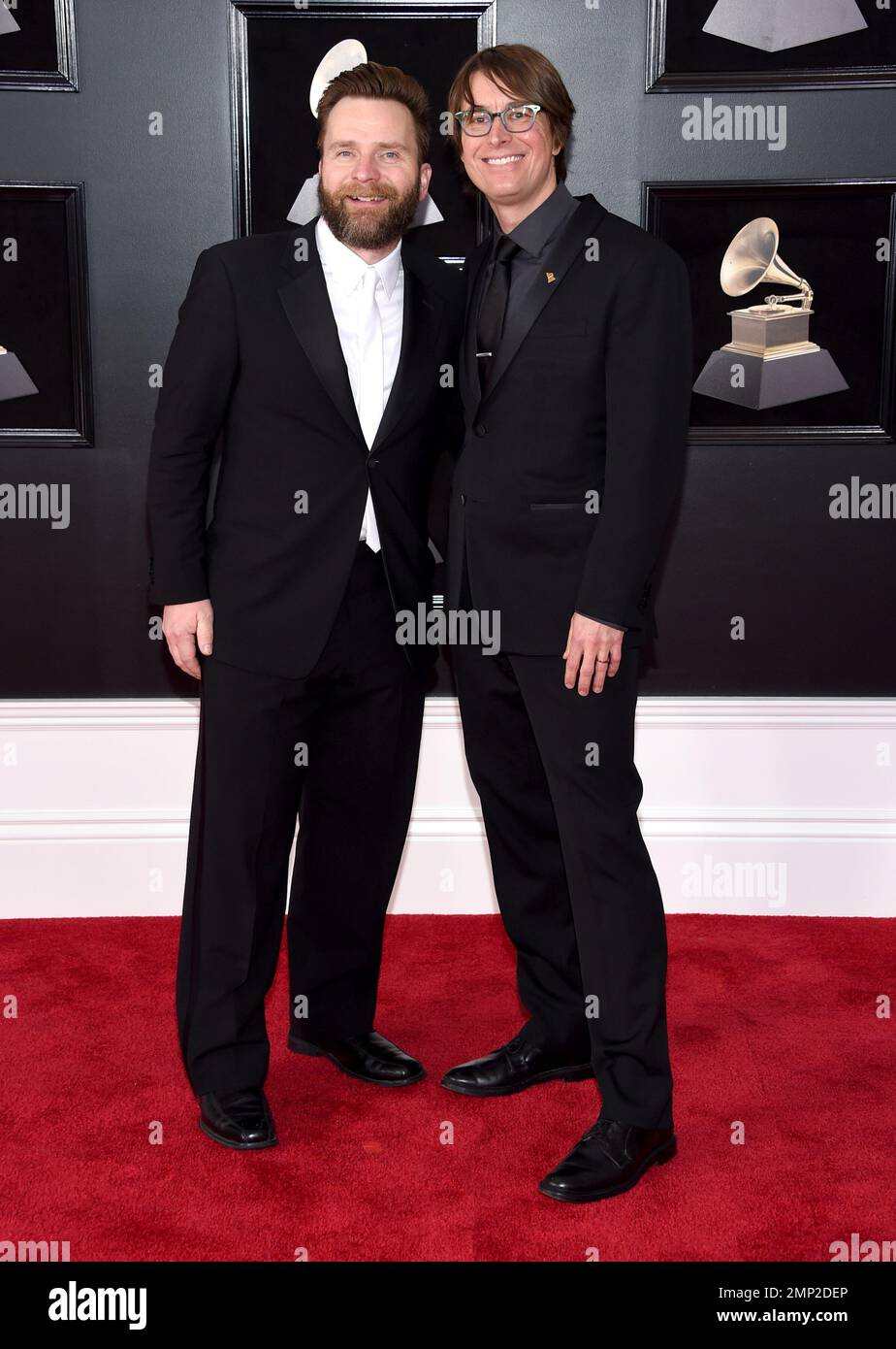 Justin Roberts, left, and Liam Davis arrive at the 60th annual Grammy ...