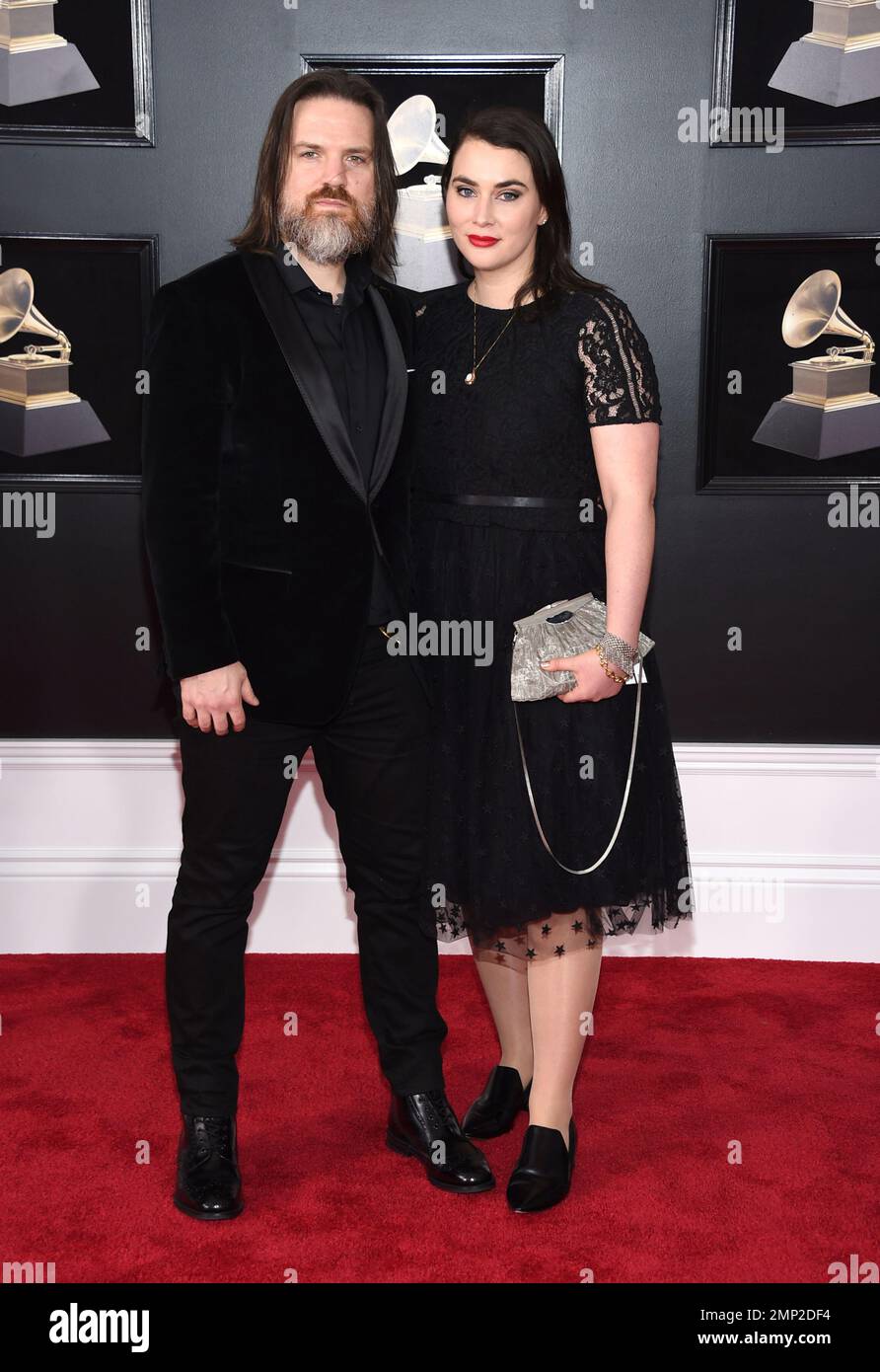 Benjamin Marra, left, arrives at the 60th annual Grammy Awards at ...