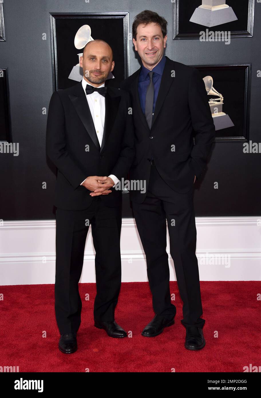 Amir Bar-Lev, left, and Ken Dornstein arrive at the 60th annual Grammy ...
