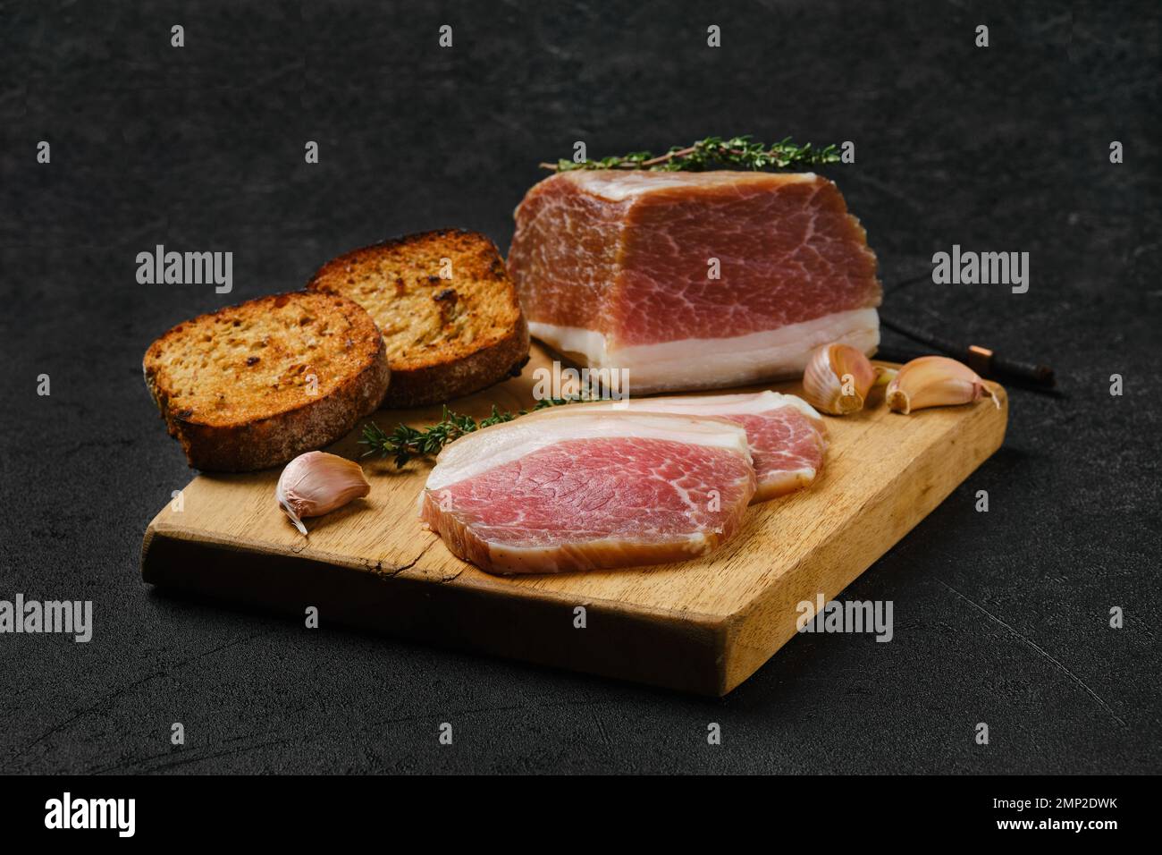 Salted pork belly joint meat with lard on wooden cutting board Stock ...