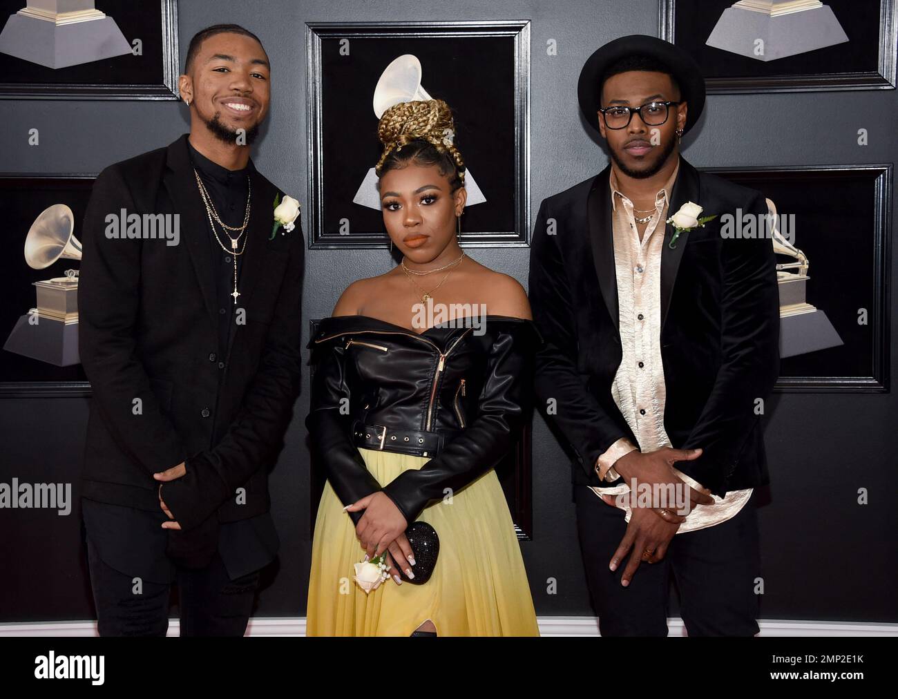 Darrel Walls, from left, Ahjah Walls and Paco Walls of The Walls Group ...