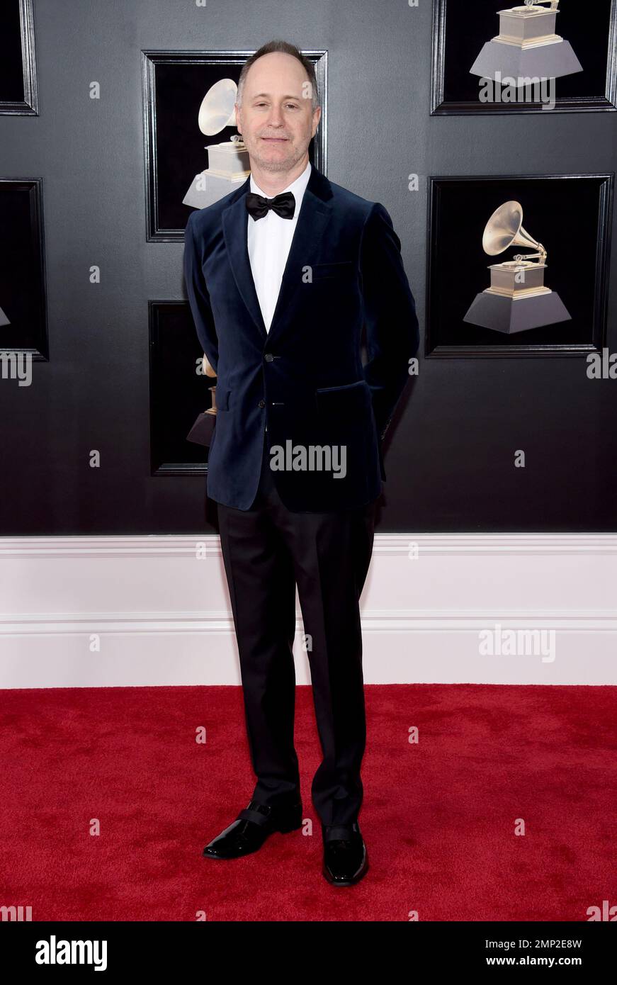 Tom MacDougall arrives at the 60th annual Grammy Awards at Madison ...