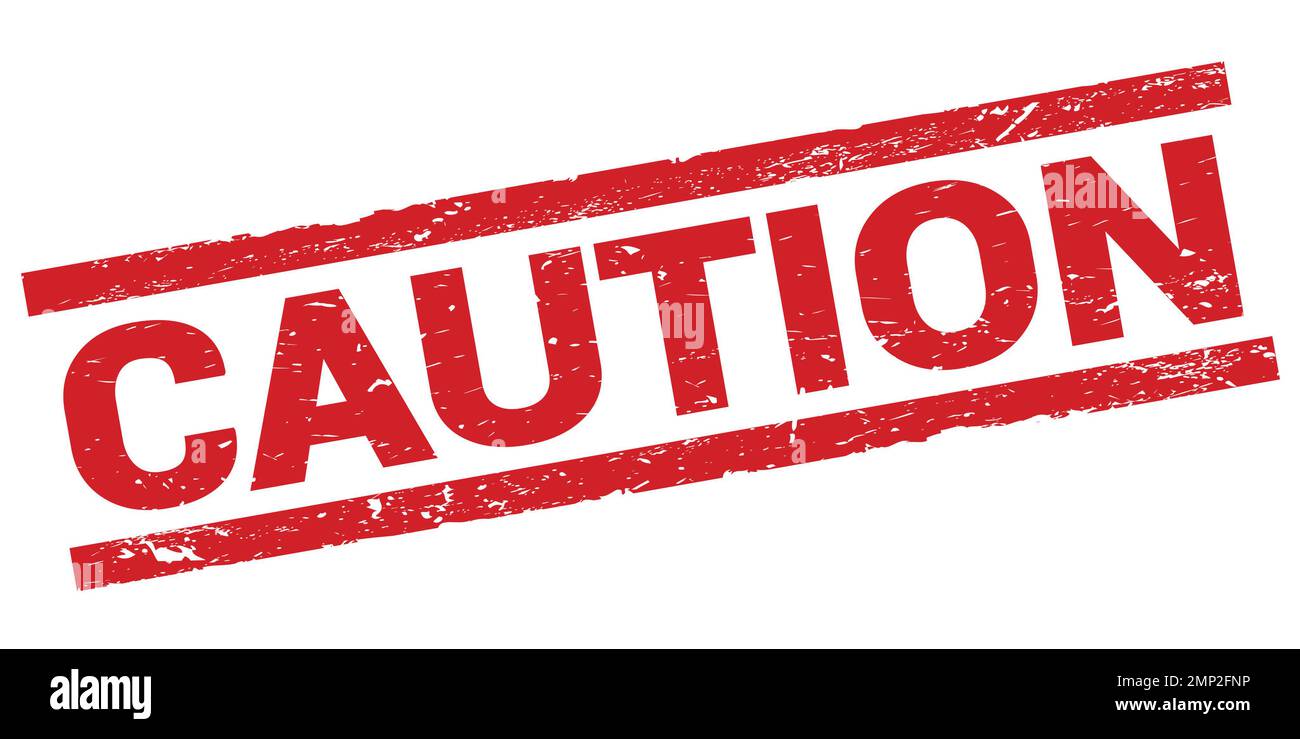 CAUTION text written on red rectangle stamp sign Stock Photo - Alamy
