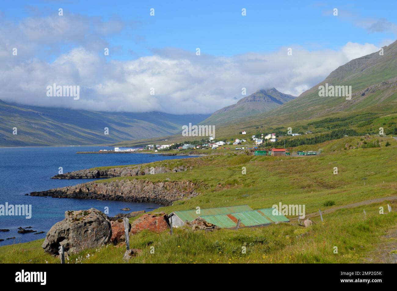 Iceland, Breiddalsvik view of the coastal settlement, surrounded by ...