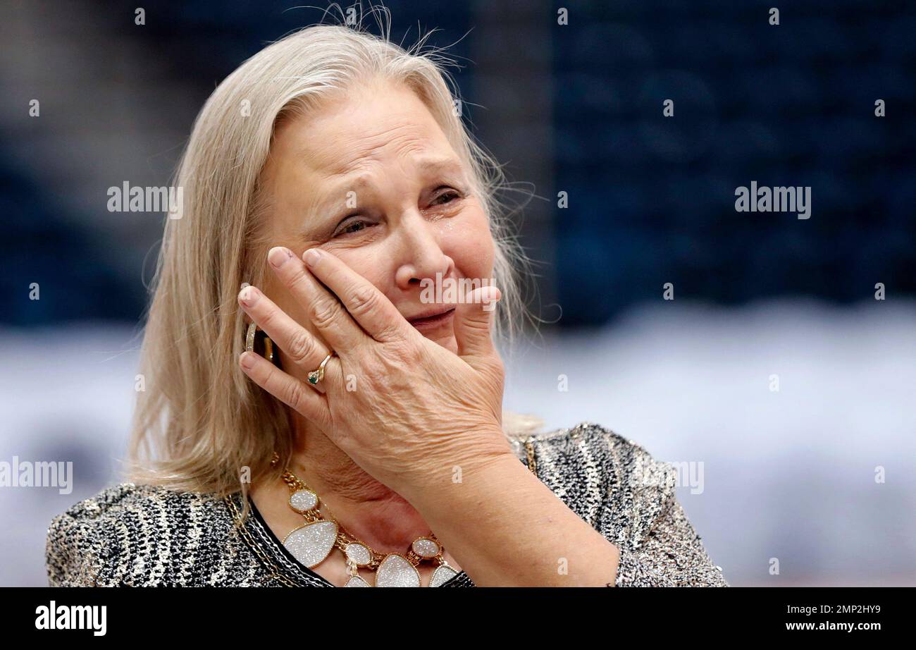 Eileen Hanson-Herkes, grandmother of the queen of the Krewe of Little Rascals, cries as she ...