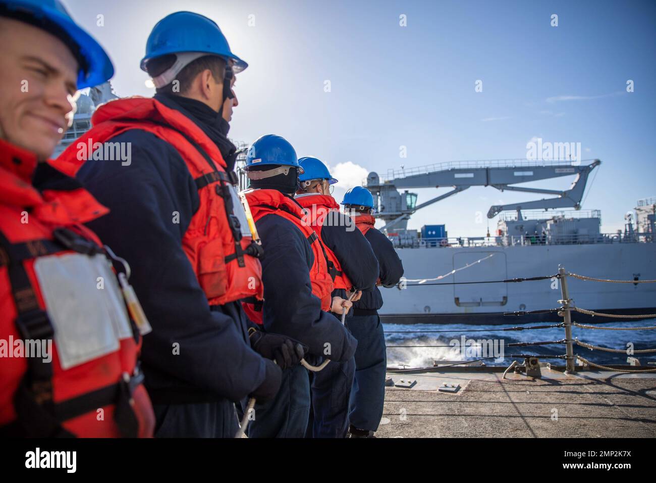 NORTH SEA (Oct. 8, 2022) Sailors hold a phone and distance line aboard ...