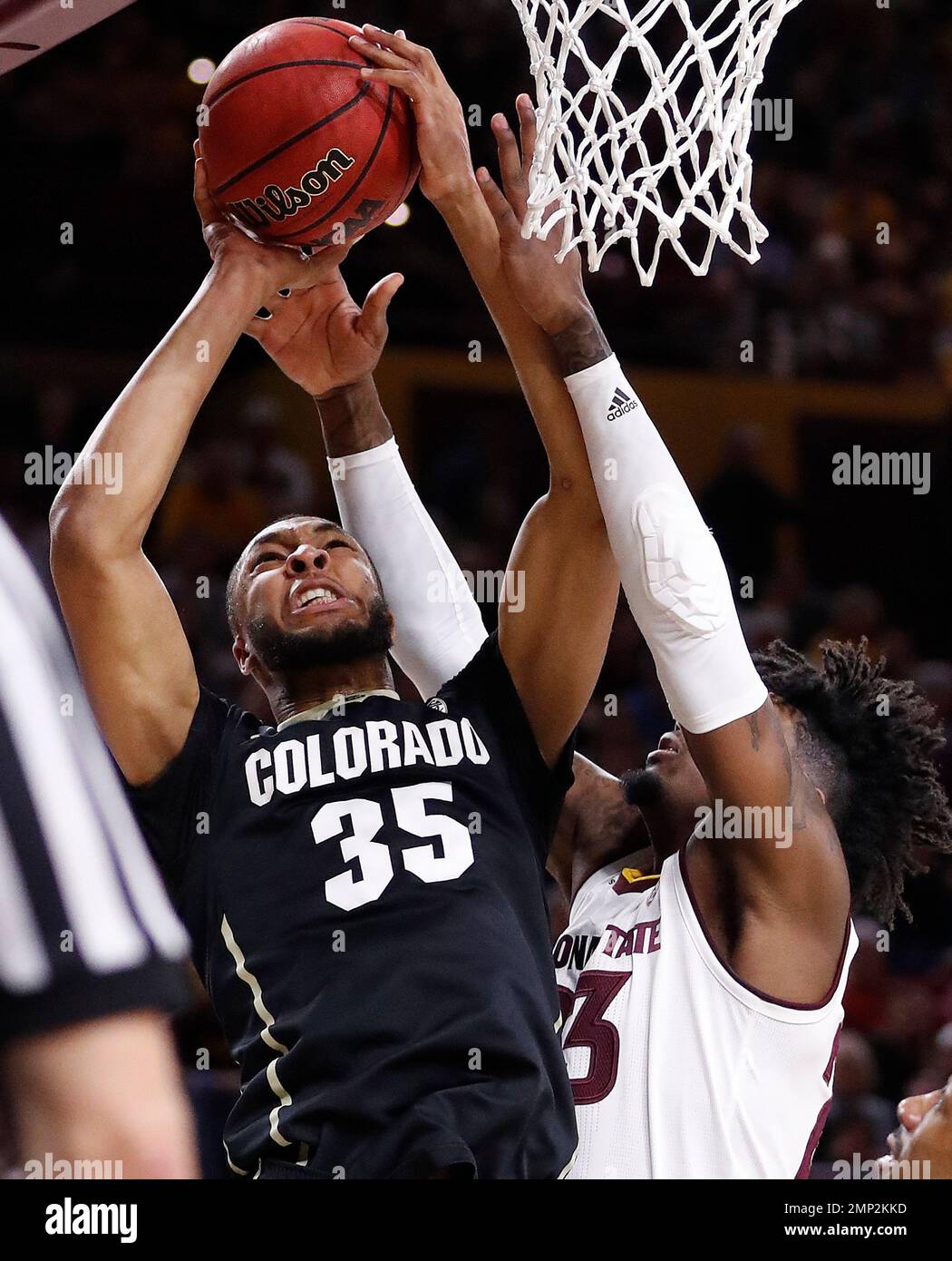Colorado forward Dallas Walton shoots over Arizona State forward ...
