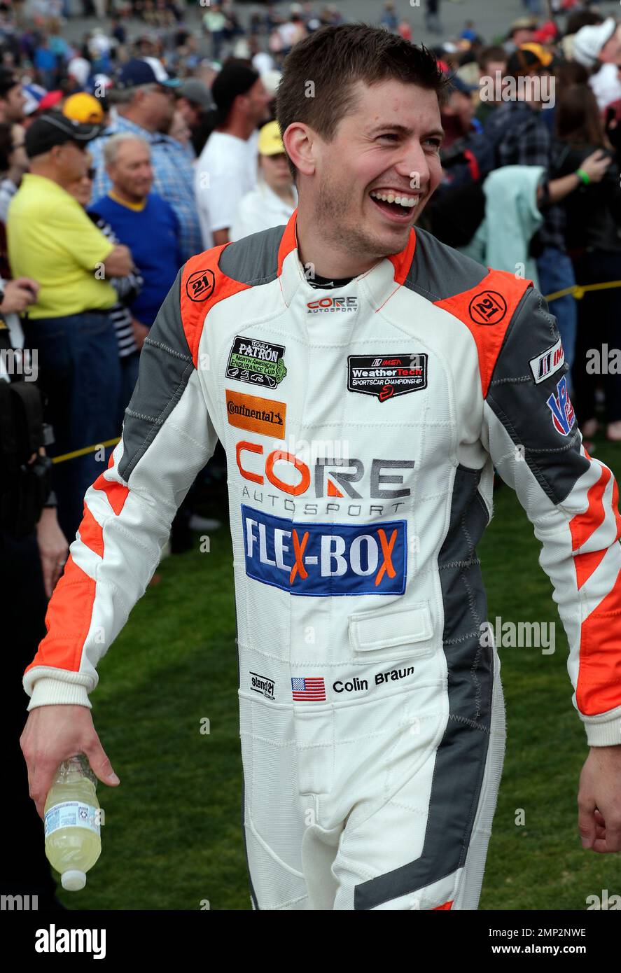 Colin Braun walks to his car along pit road before the start of the ...