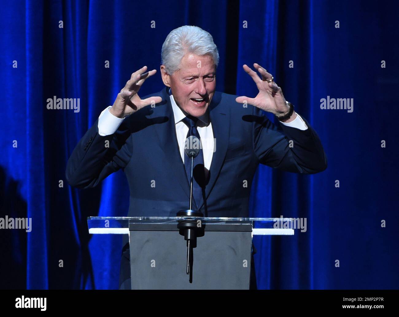 Former U.S. President Bill Clinton speaks onstage at the 2018 MusiCares ...