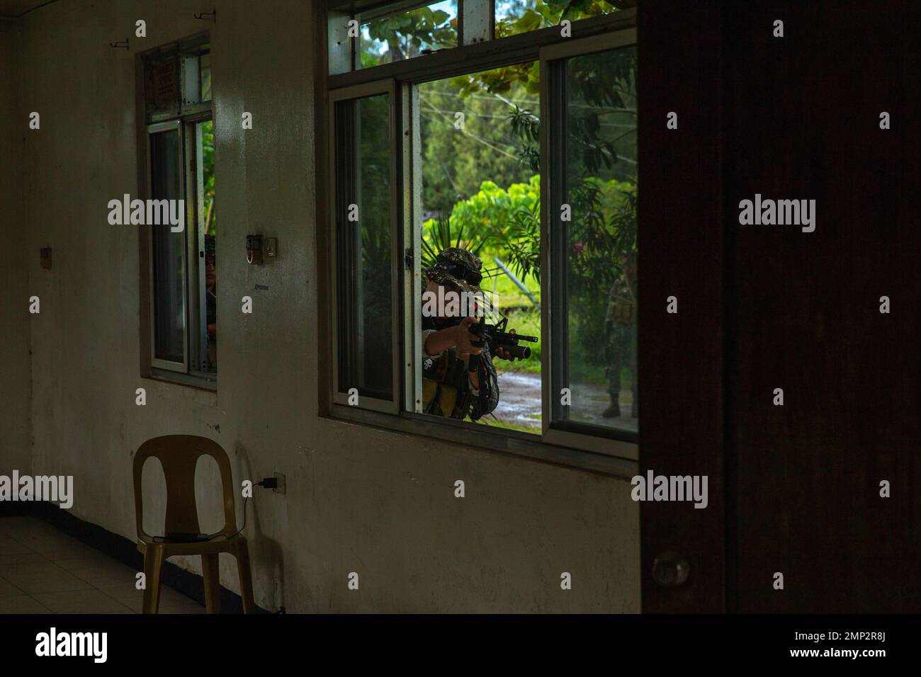 A Philippine Marine with Marine Battalion Landing Team 10 conducts ...