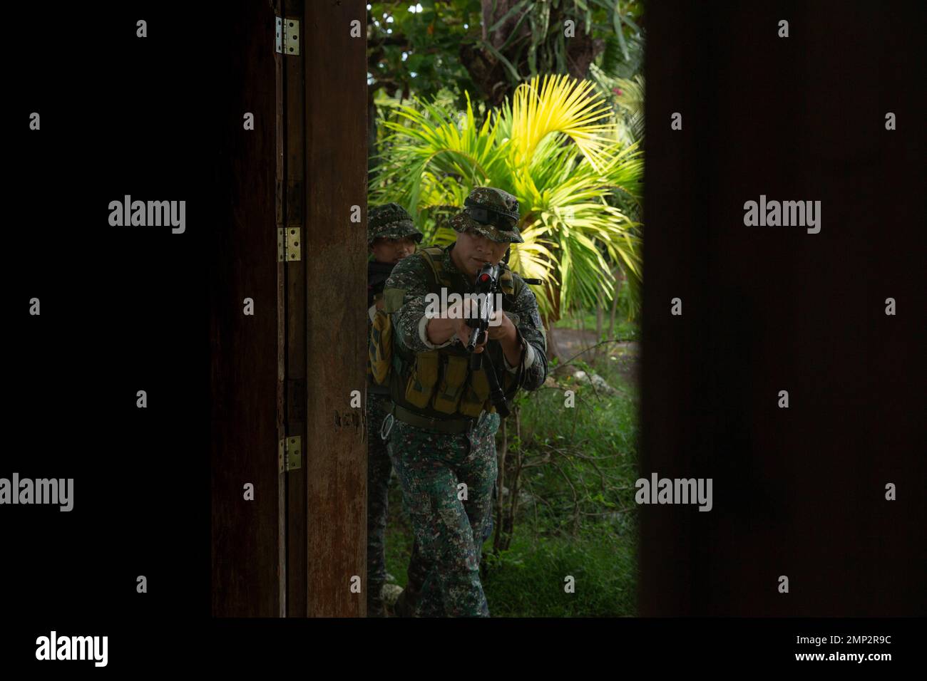 Philippine Marines with Marine Battalion Landing Team 10 conduct close ...