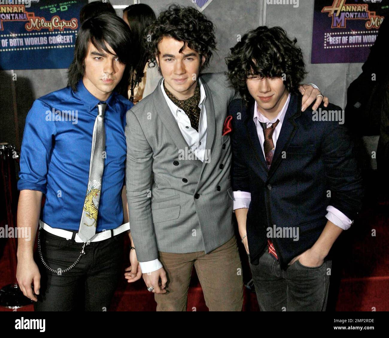 The Jonas Brothers at the world premiere of Hanna Montana & Miley Cyrus ...