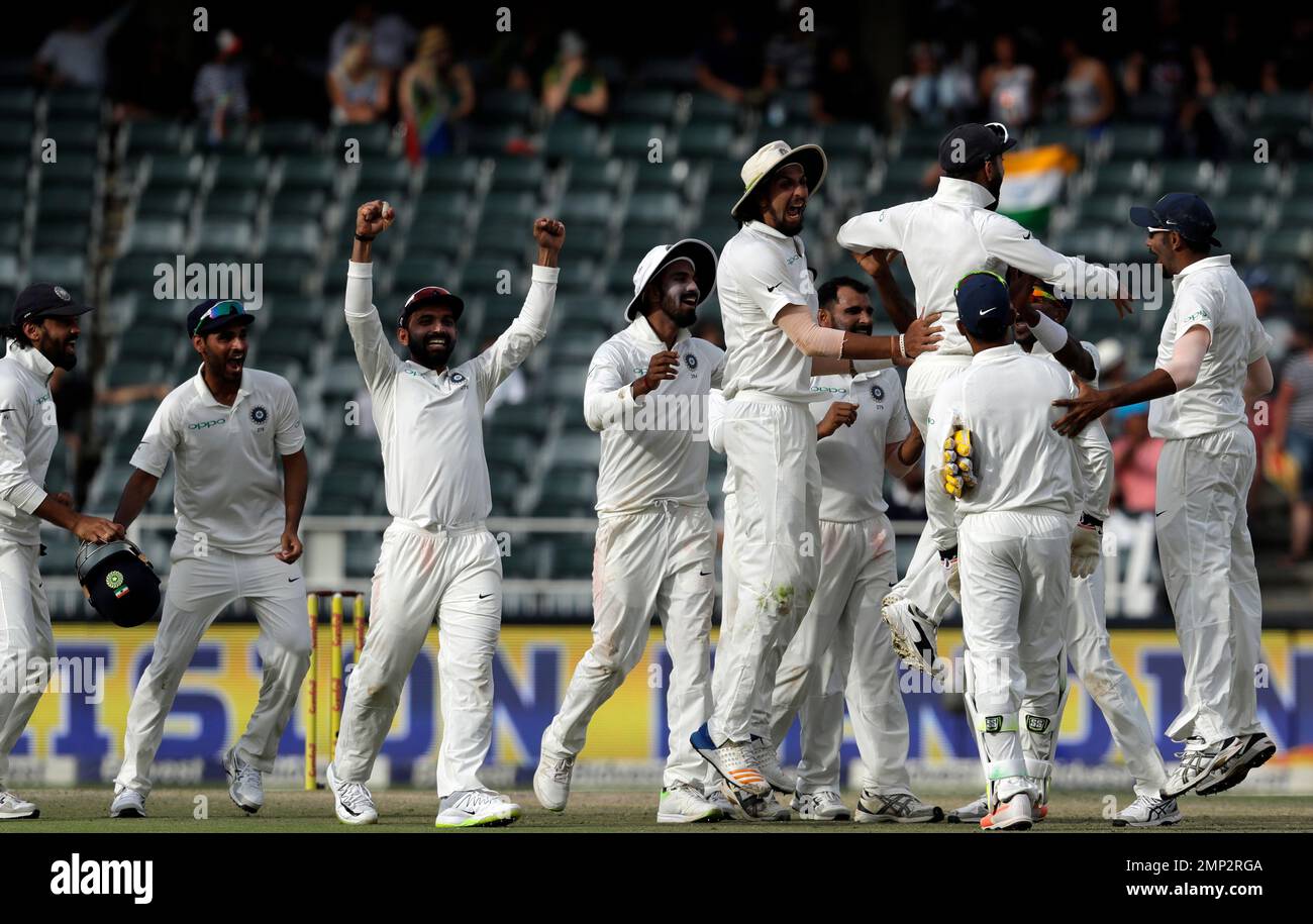 India players celebrate after winning the fourth day of the third ...