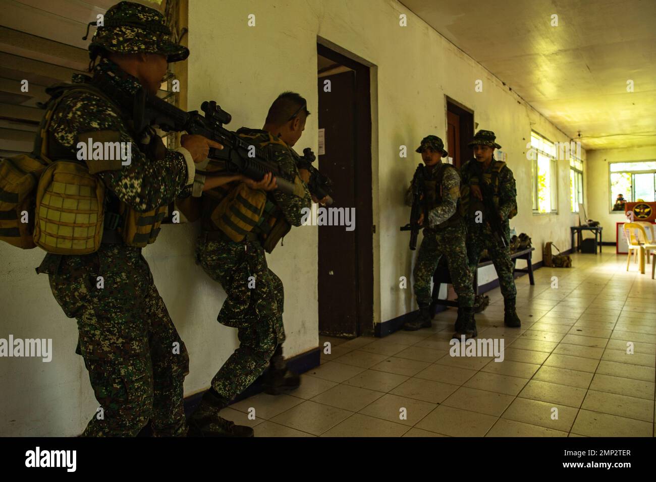 Philippine Marines with Marine Battalion Landing Team 10 conduct close ...