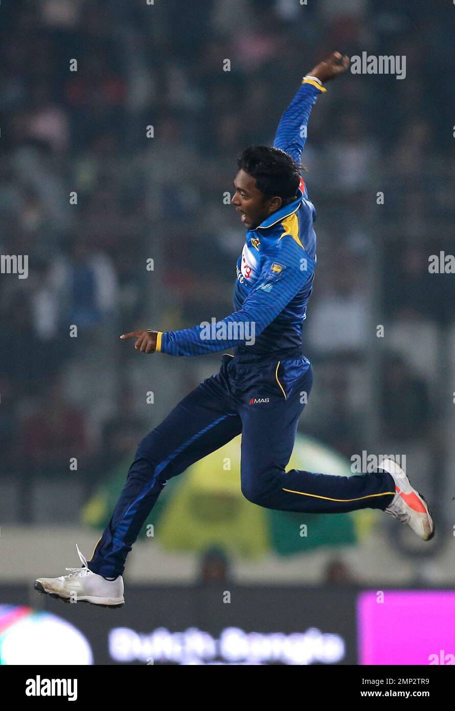 Sri Lanka's Akila Dananjaya celebrates the dismissal of Bangladesh's ...