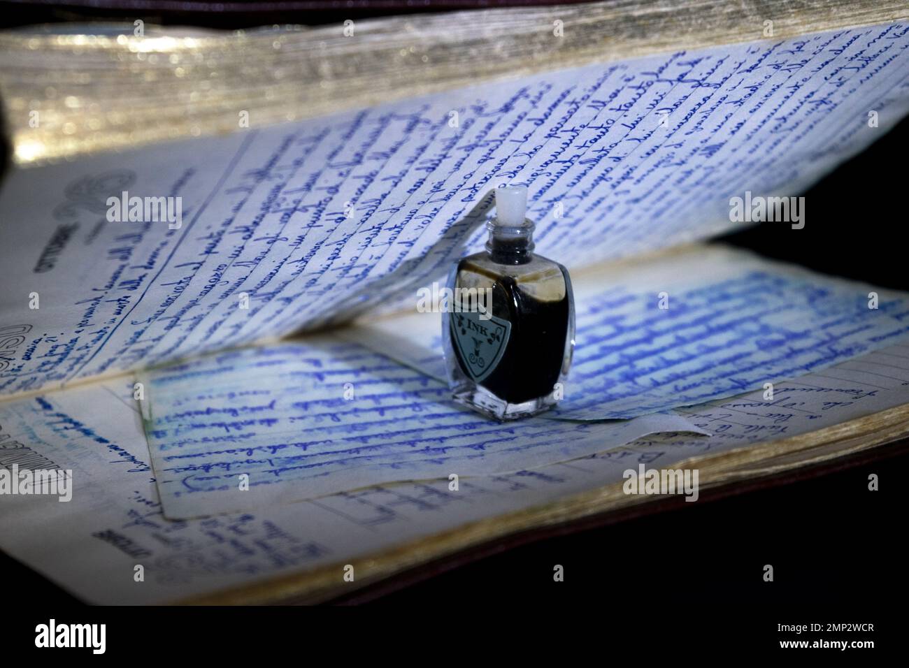 old handwritten paper diary and bottle of ink Stock Photo - Alamy