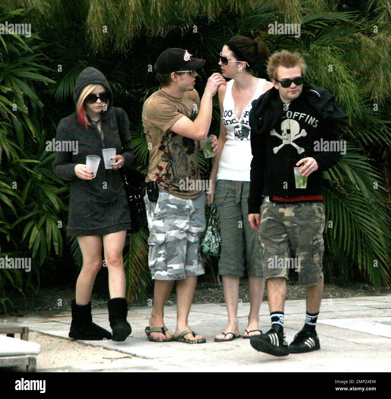 Avril Lavigne and hubby Deryck Whibley get the party started while on ...