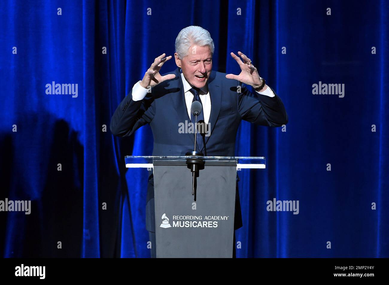 Former President Bill Clinton speaks onstage at the 2018 MusiCares ...
