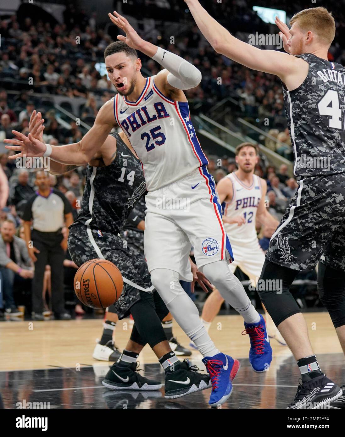 Philadelphia 76ers' Ben Simmons (25) loses the ball as Antonio Spurs ...