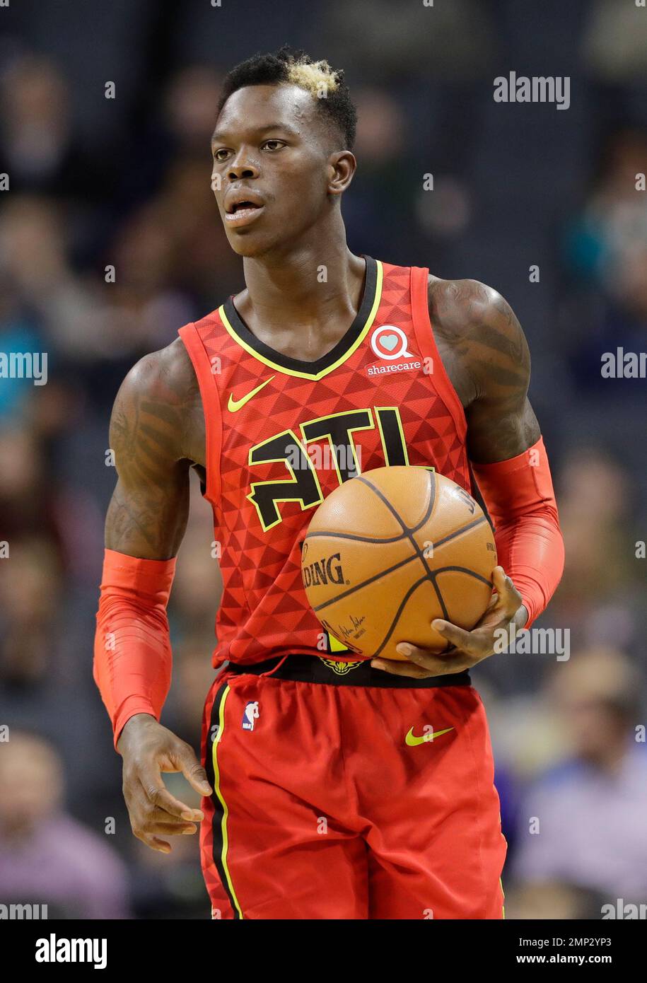 Atlanta Hawks' Dennis Schroder (17) brings the ball up the court ...