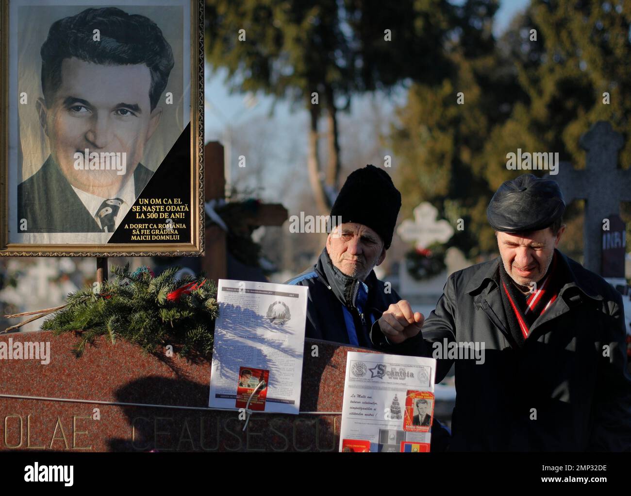 A man grimaces next to the grave of Romanian communist dictator Nicolae ...